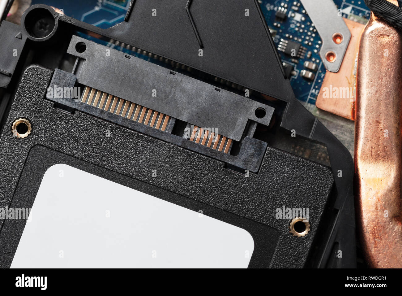 installing new solid-state drive to laptop pc. sata and power ...