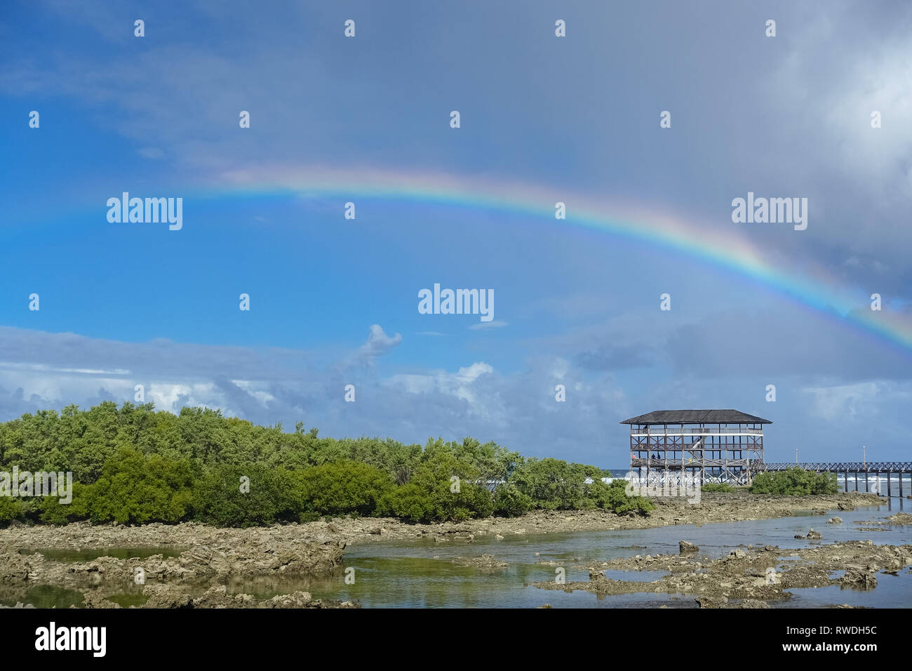 Rainbow Over Boardwalk at Cloud 9 Beach - Siargao, Philippines Stock ...
