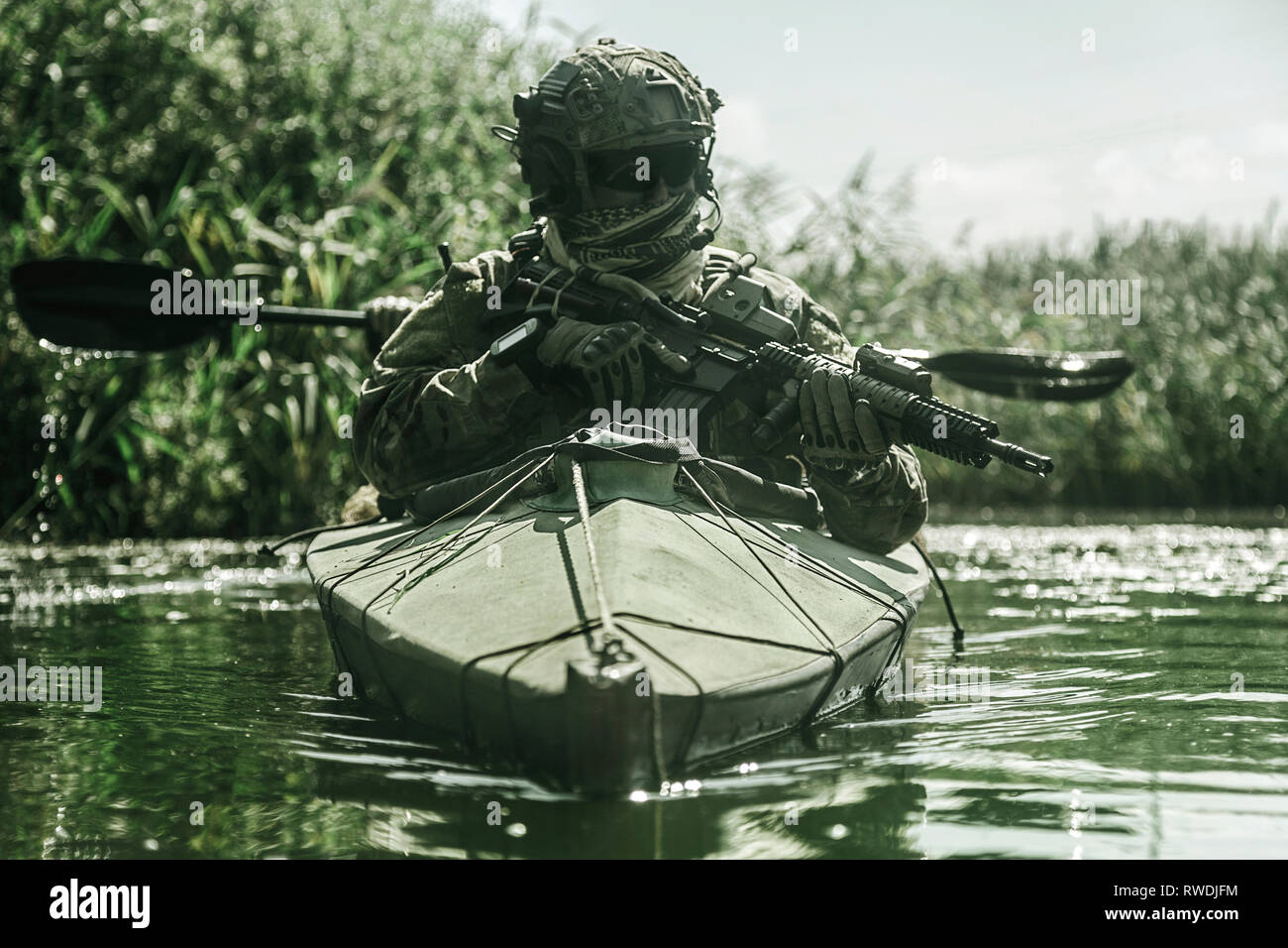 Spec ops in the military kayak Stock Photo - Alamy