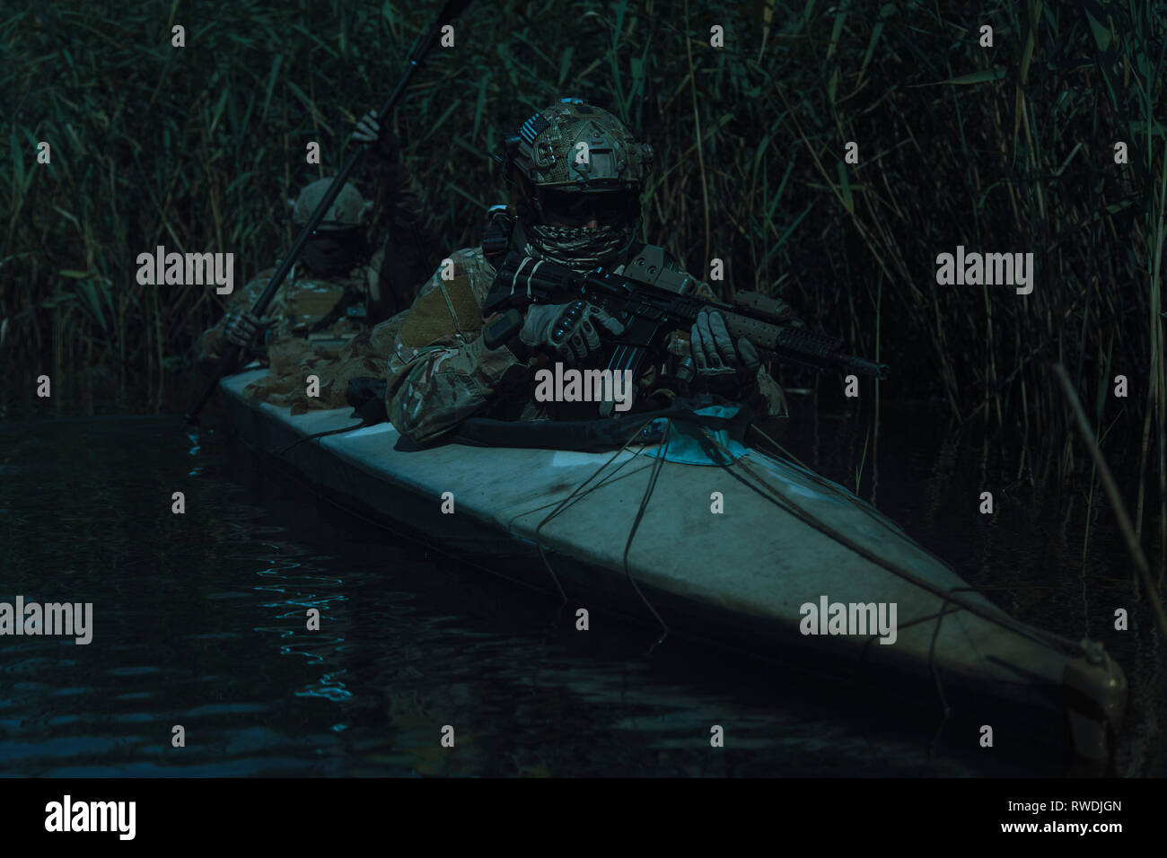 Special forces operators in a military kayak Stock Photo - Alamy
