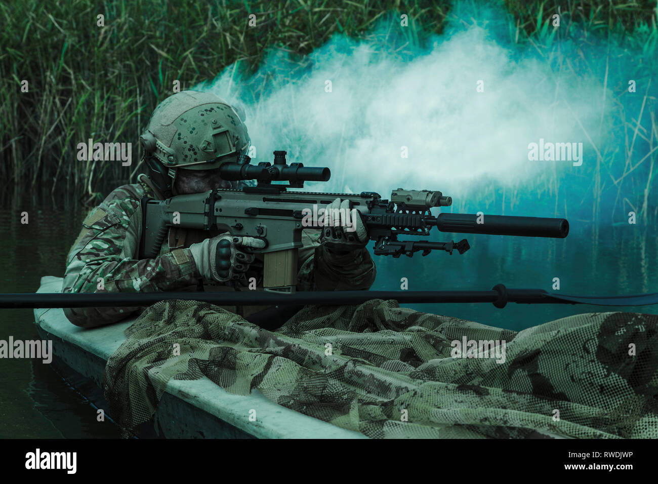 Special forces operators in a military kayak Stock Photo - Alamy