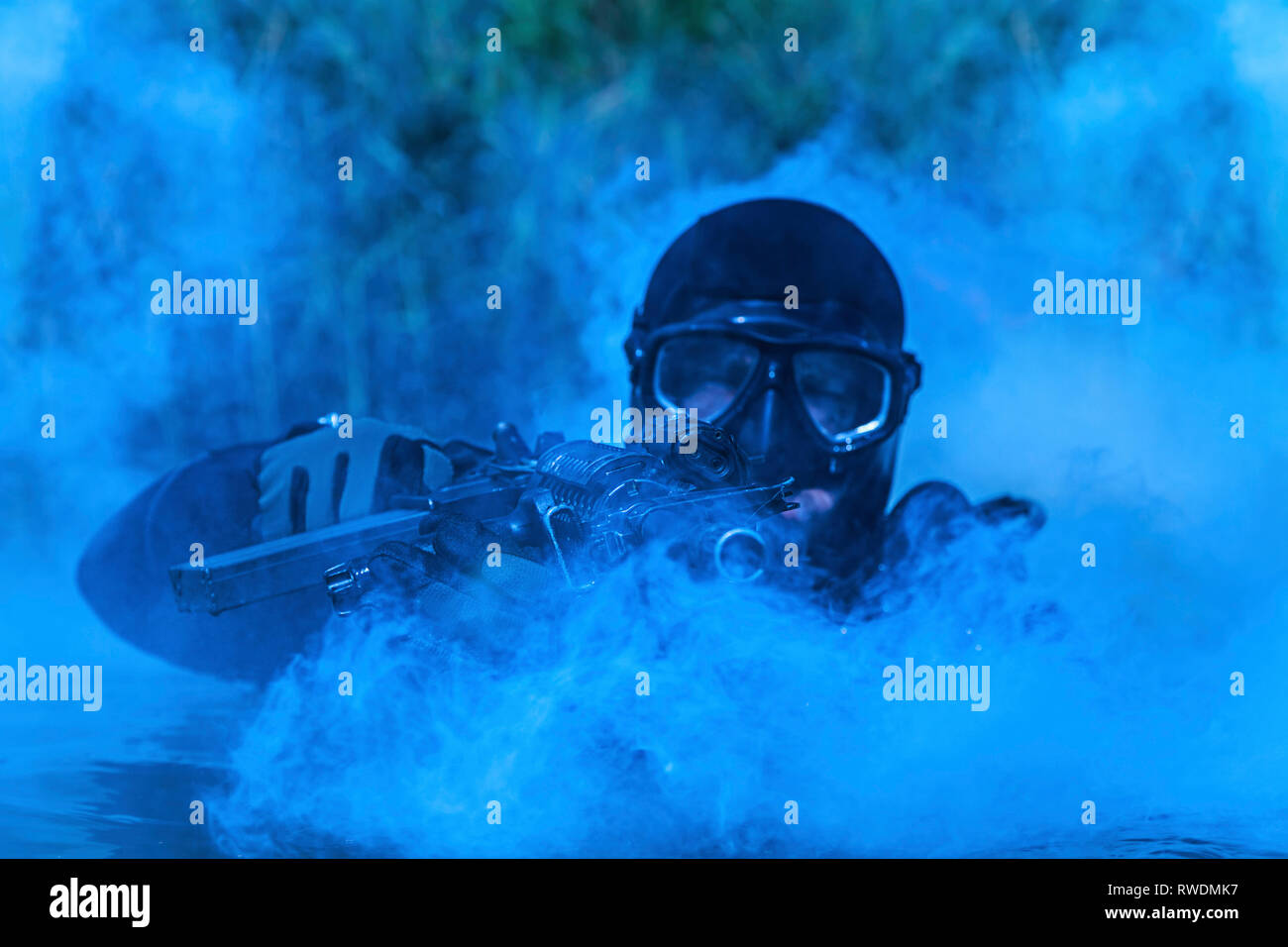 Frogman with complete diving gear and weapons in the water Stock Photo ...