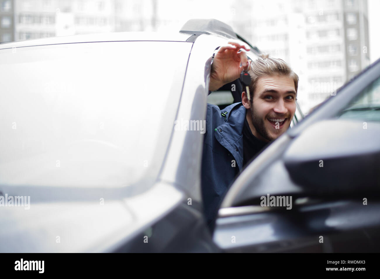happy business man in his new car Stock Photo - Alamy