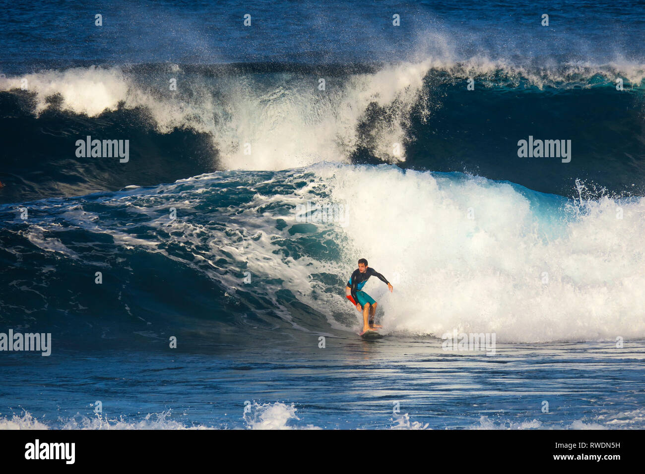Caucasian Surfer Riding Waves at Cloud 9 - Siargao, Philippines Stock ...