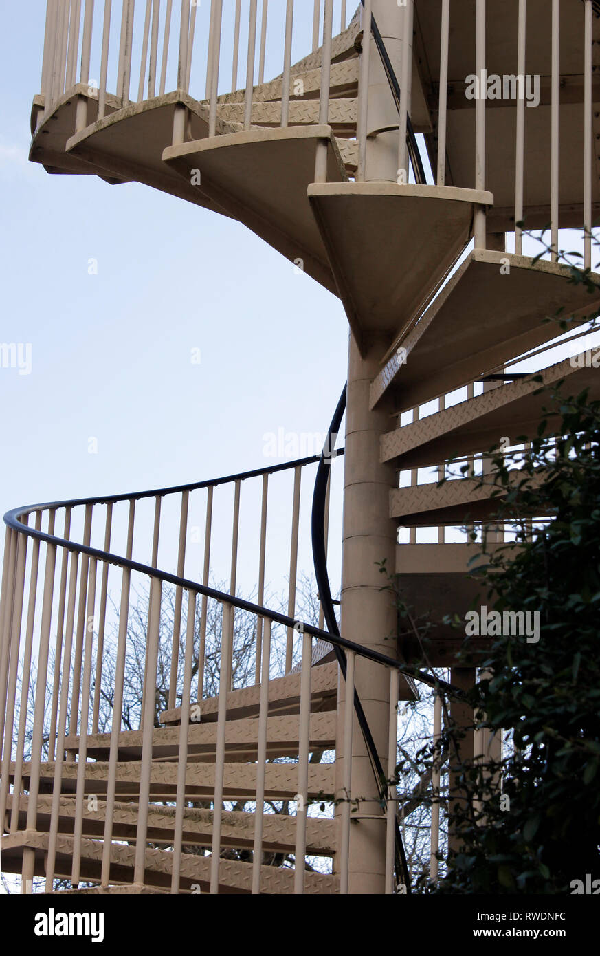 Galvanised steel exterior spiral staircase - fire escape Stock Photo ...