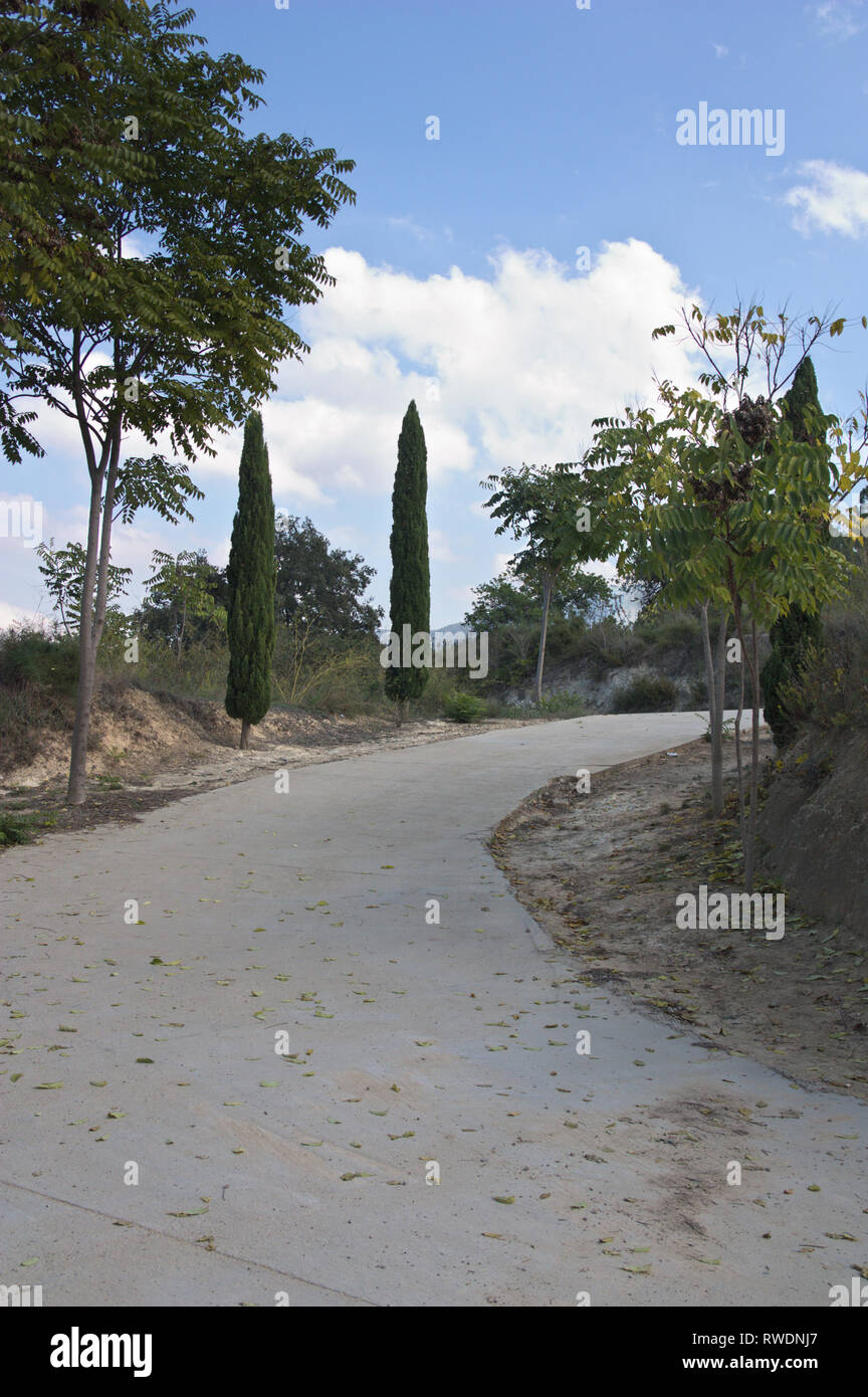 Path that climbs a curve to the right marked with different types of ...