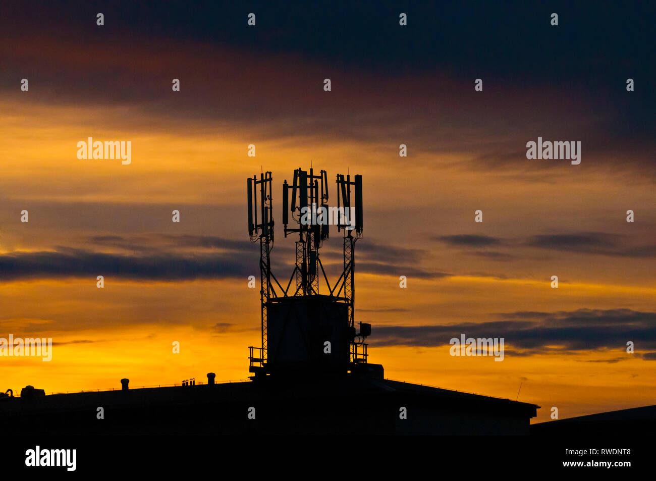 Building with cell tower antennas hi-res stock photography and images ...