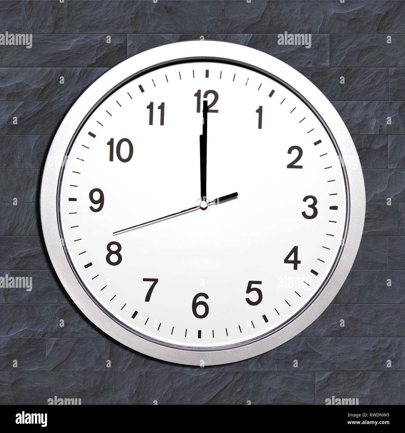 Wall Clock Set At Noon Or Twelve O clock Stock Photo Alamy