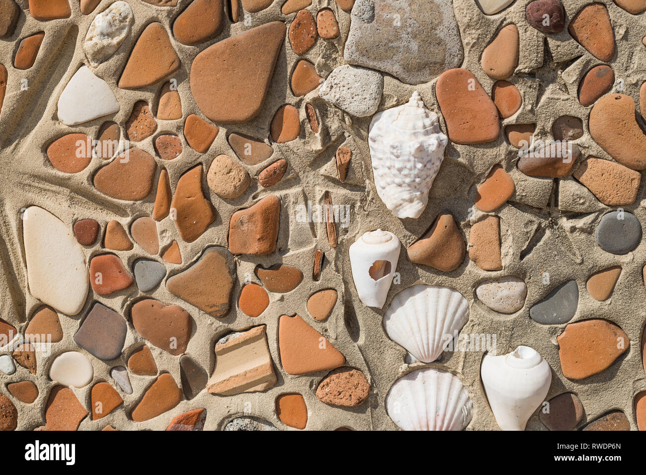 Concept of ancient culture Close up photo of broken colored stones and ...