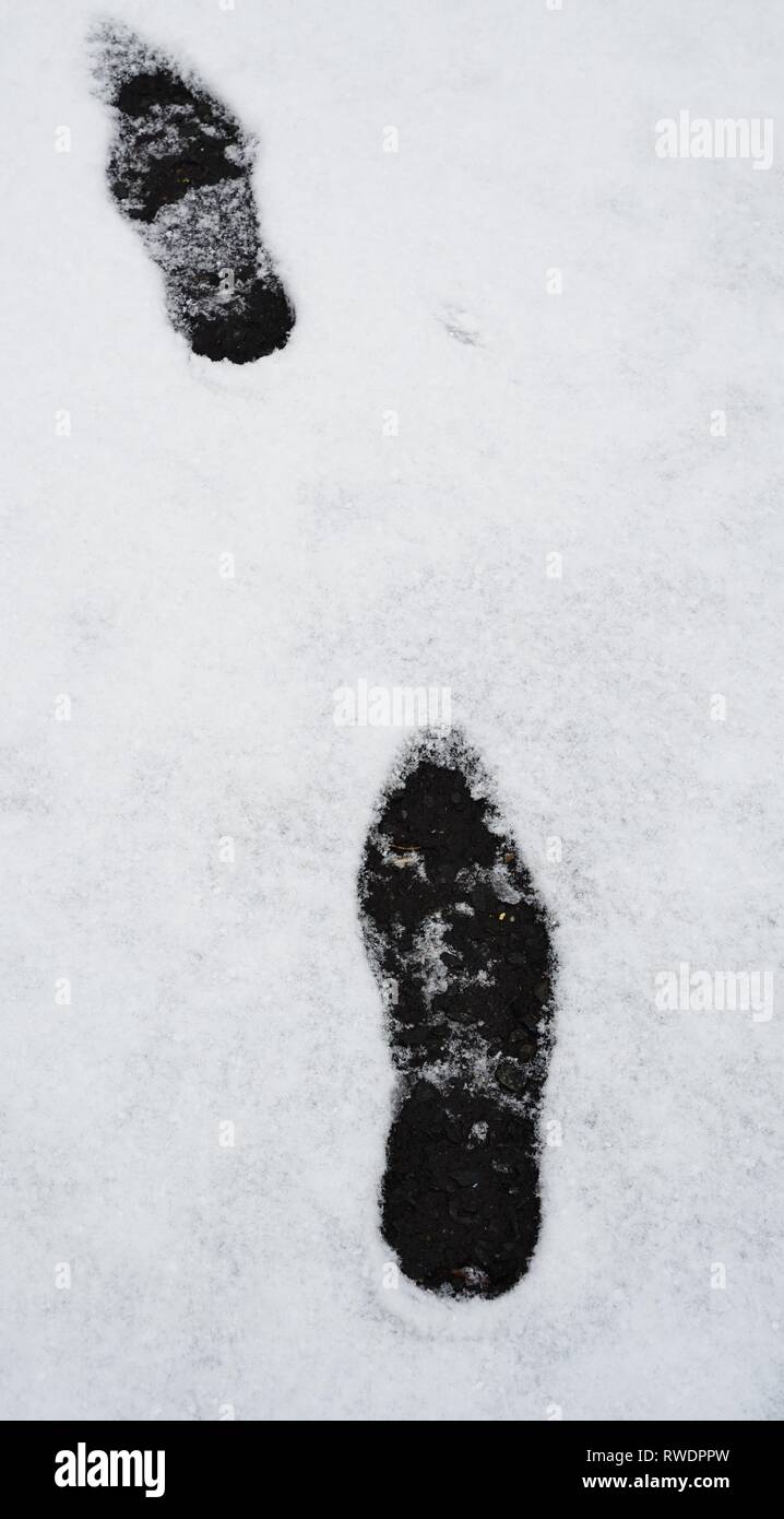 Footsteps in the fresh white snow Stock Photo - Alamy Footsteps in the fresh white snow Stock Photo - Alamy