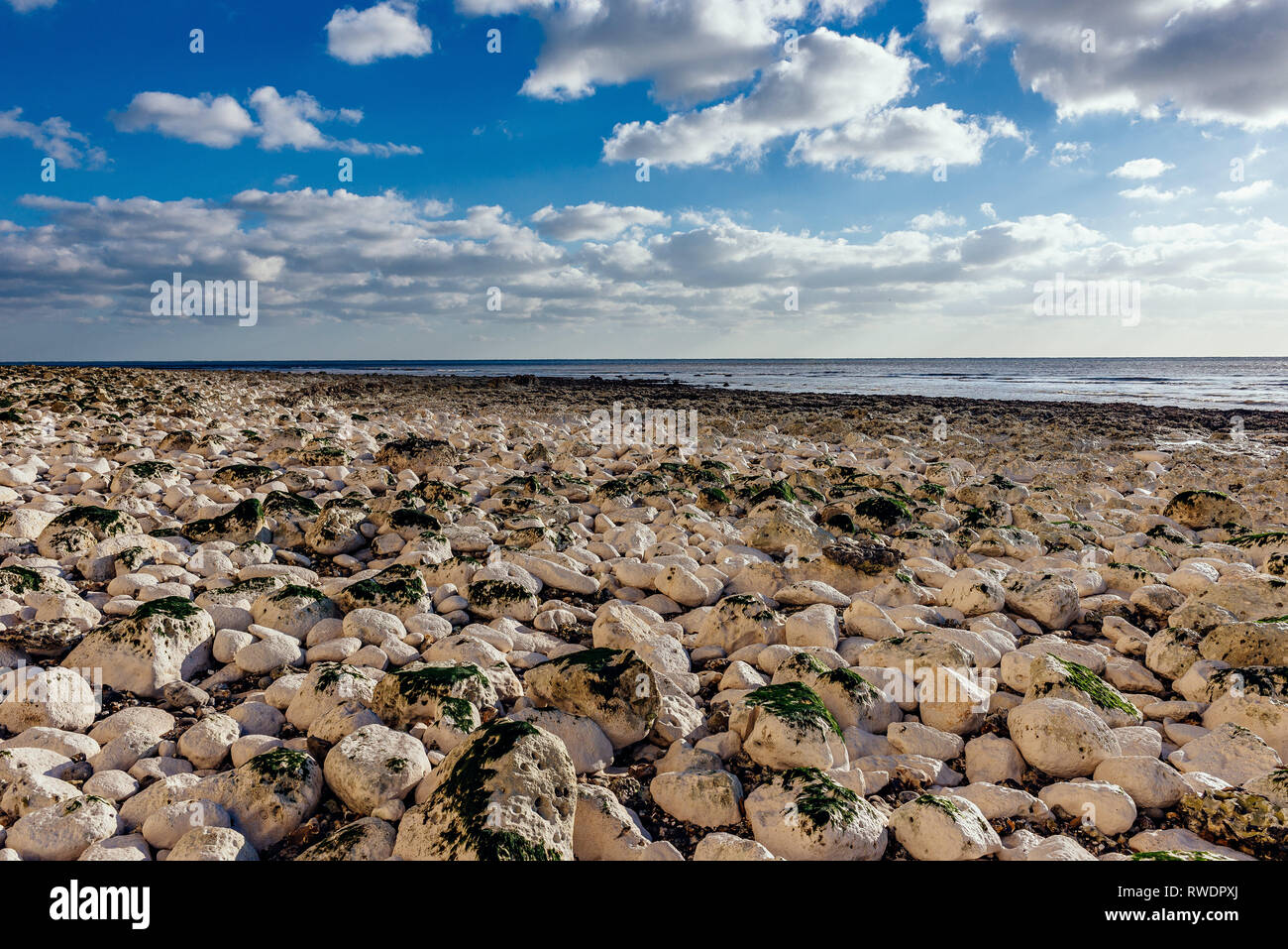 Flat sea with rocks hi-res stock photography and images - Alamy