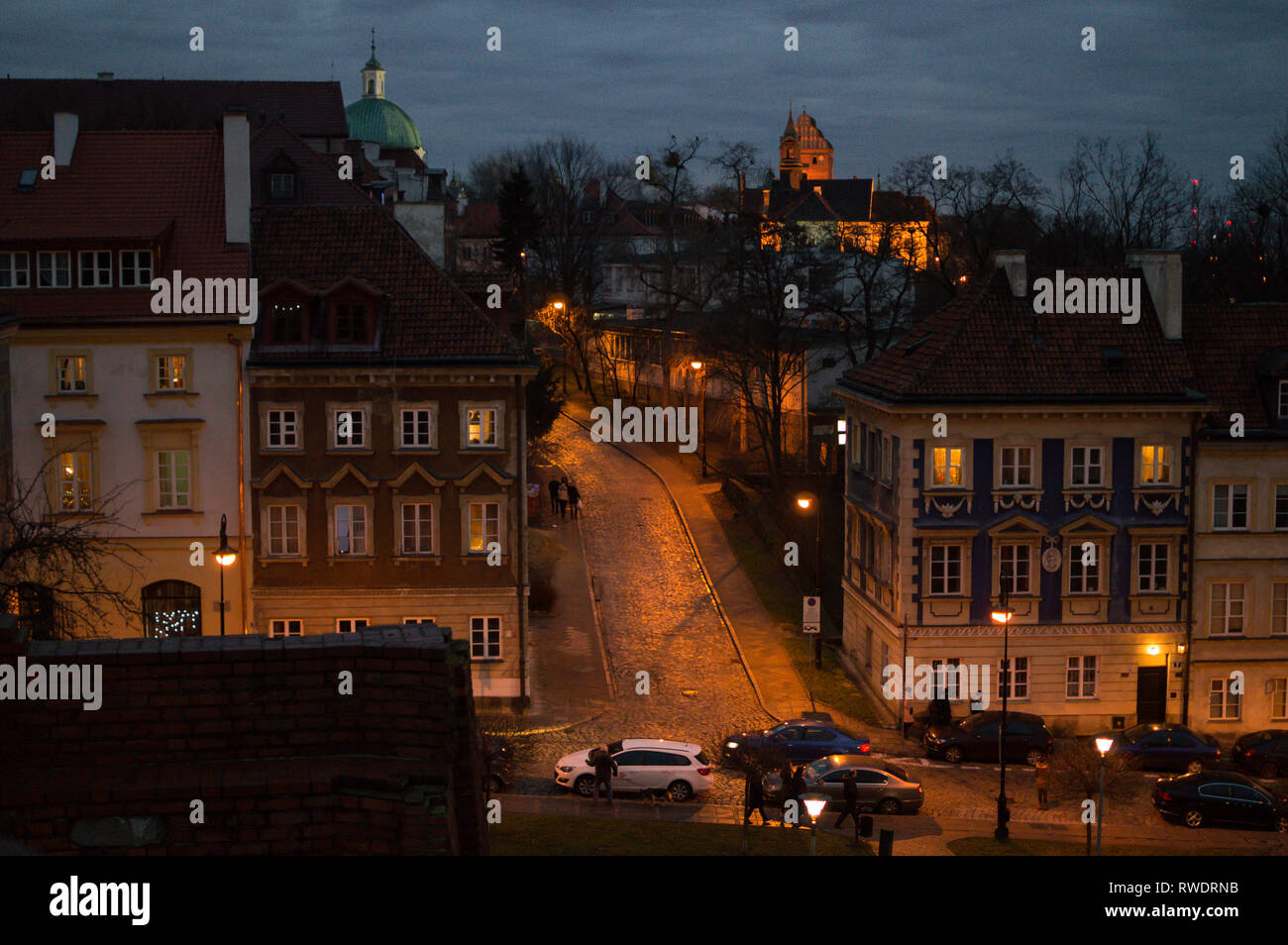 Townhouses in Warsaw, Poland at Night Stock Photo - Alamy
