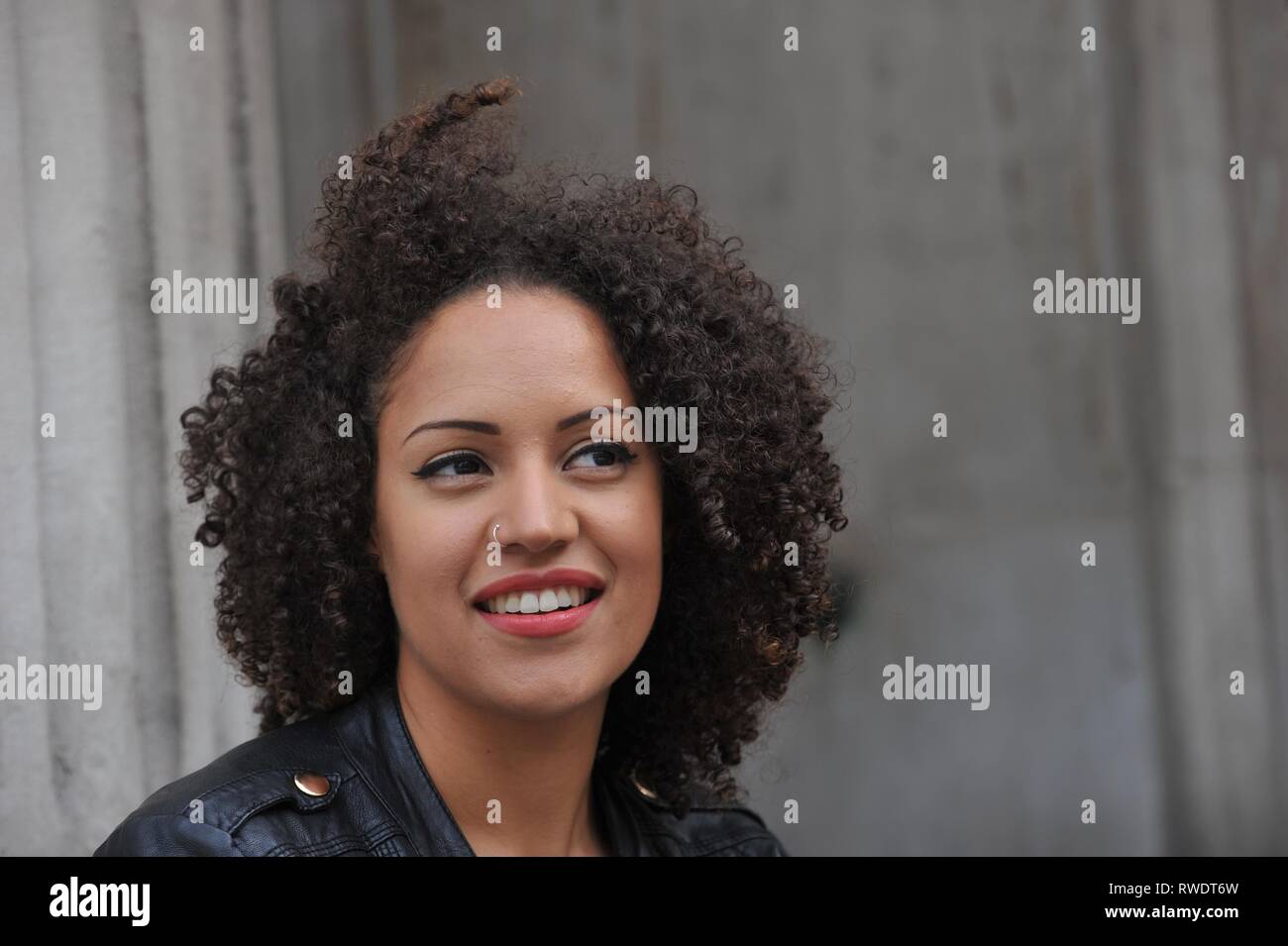 Head shots, portraits of beautiful young mixed race woman using natural ...