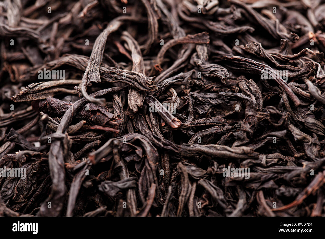 pile of abstract black tea leaves Stock Photo - Alamy