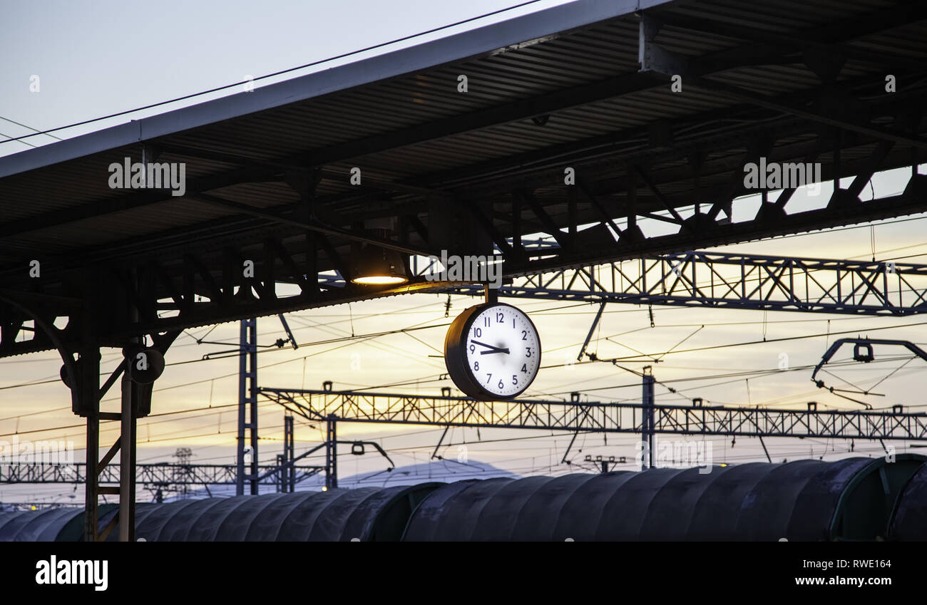 Clock in train station, detail of information for travelers Stock Photo ...