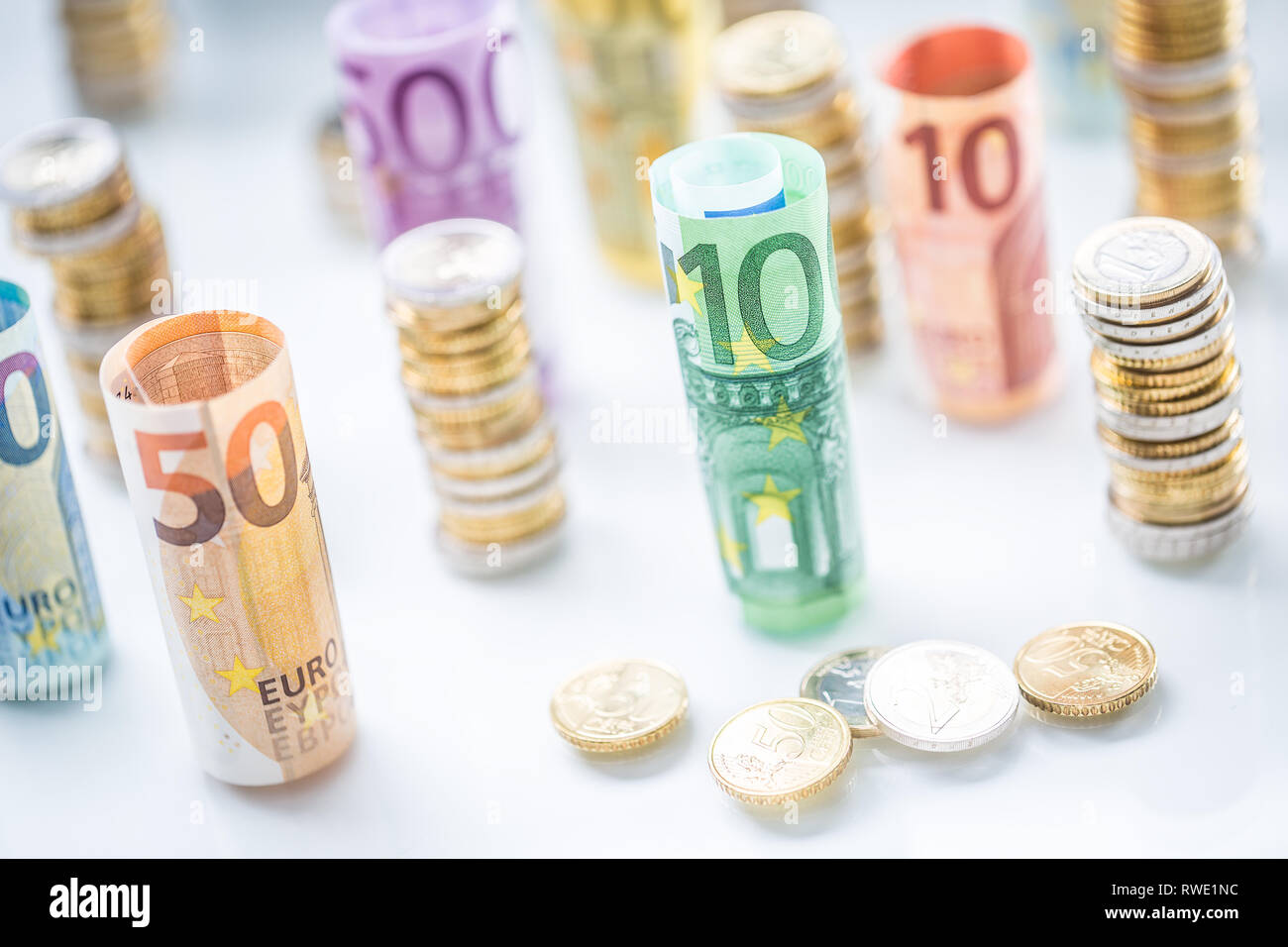 Rolled coins hi-res stock photography and images - Alamy