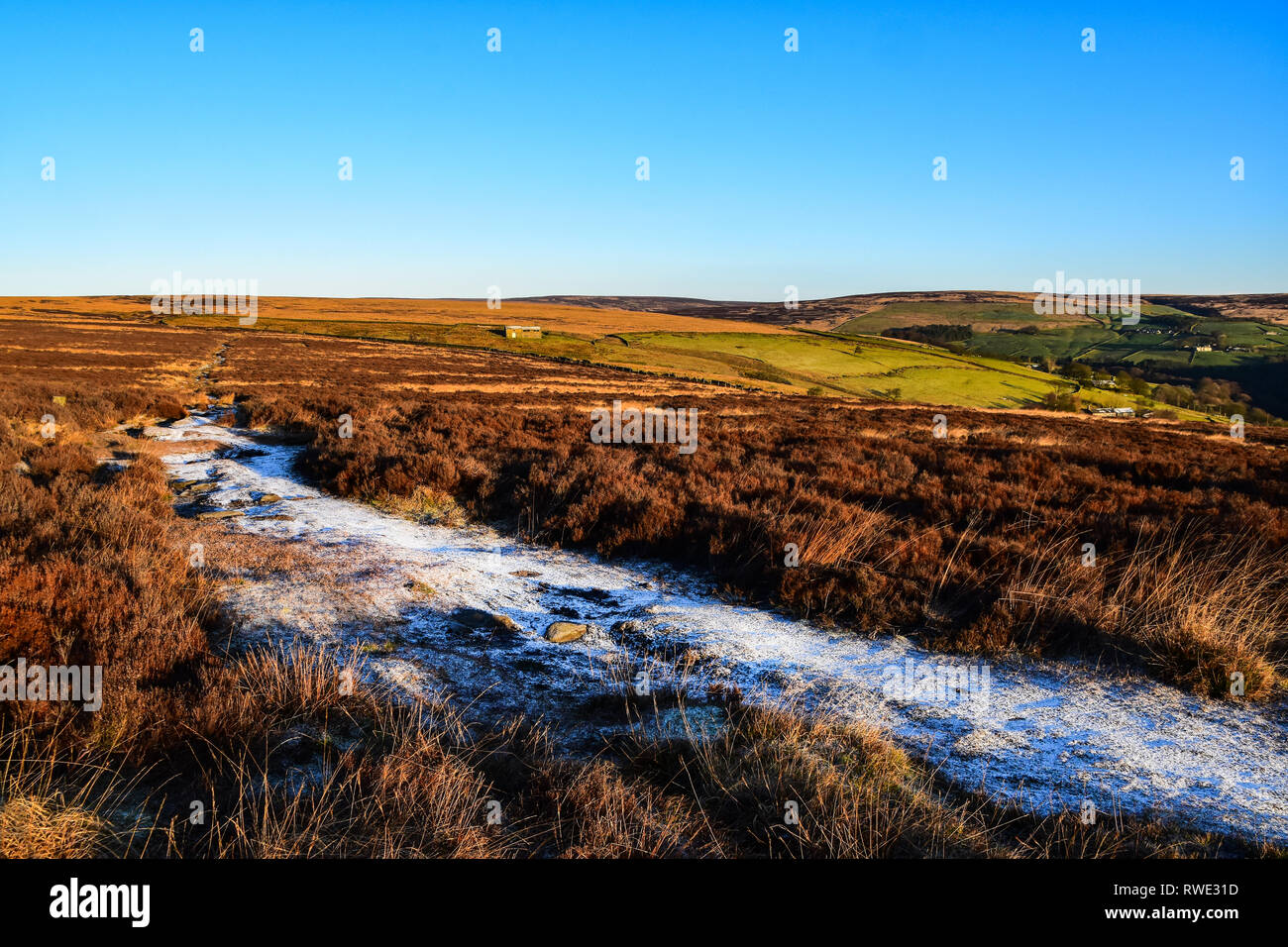 Snowy footpath on Winter Moorland landscape, Heptonstall Moor ...