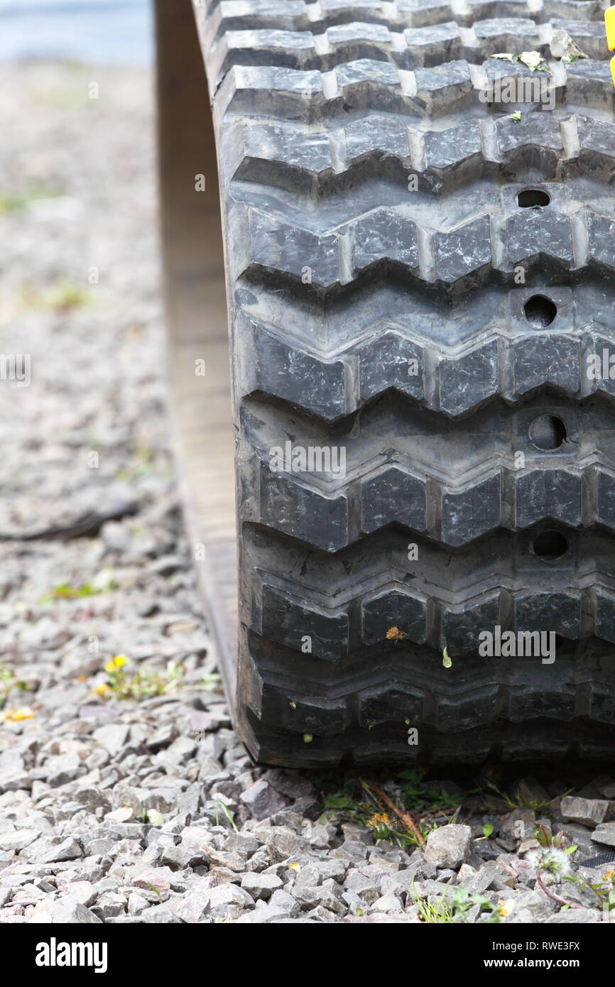 Tracks of small digger excavator heavy equipment industrial detail ...