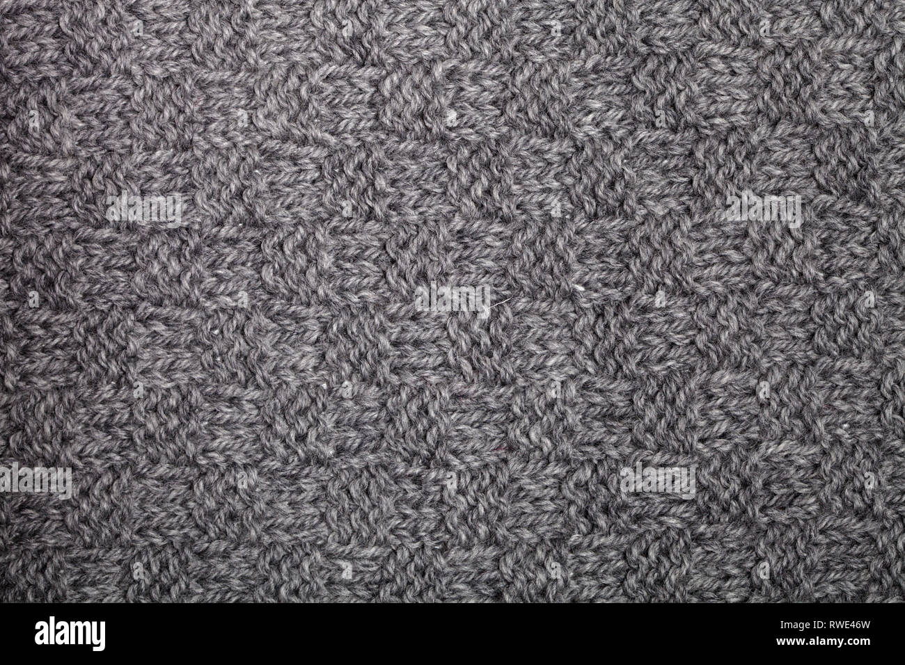 Knitted grey scarf texture background Stock Photo - Alamy
