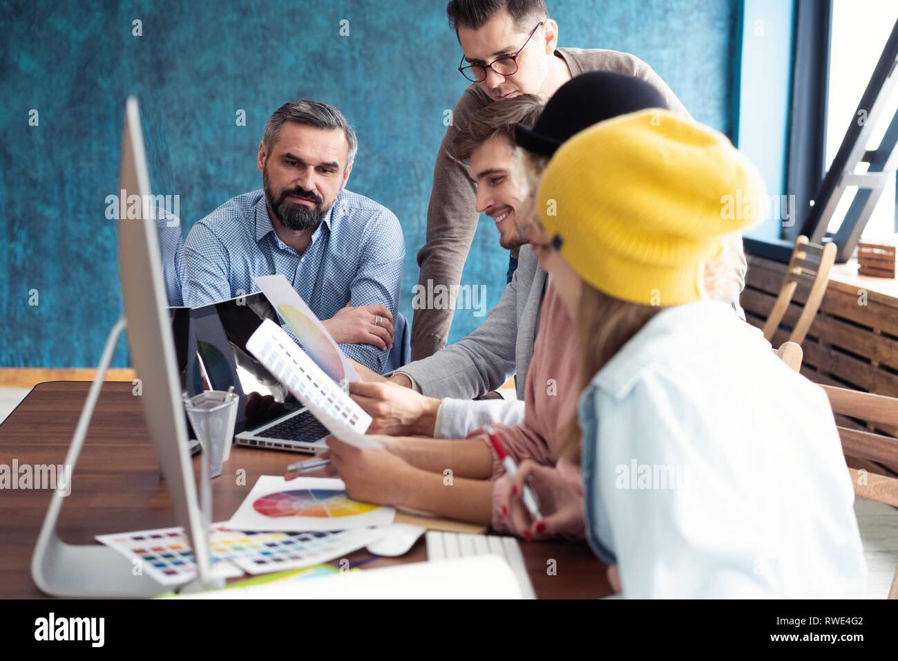 Successful team. Group of young business people working and ...