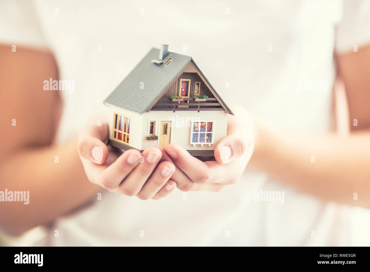 Woman hand holding building hi-res stock photography and images - Alamy