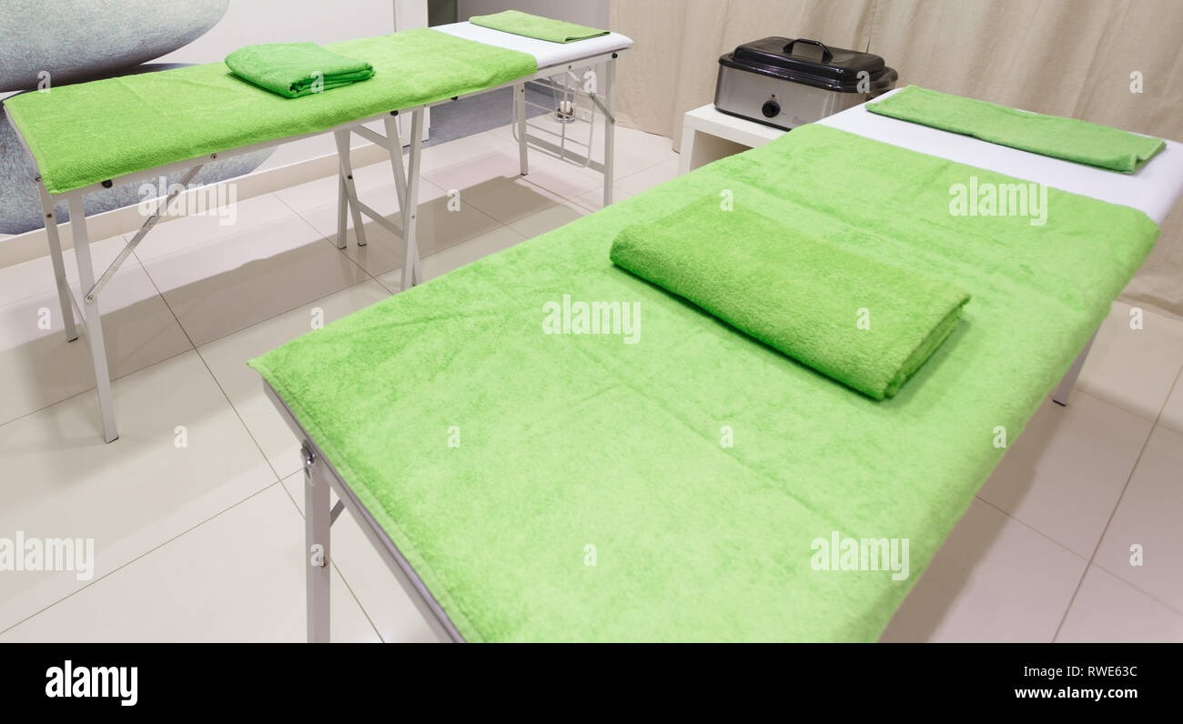 Interior of massage treatment room in beauty healthy spa salon. Luxury ...