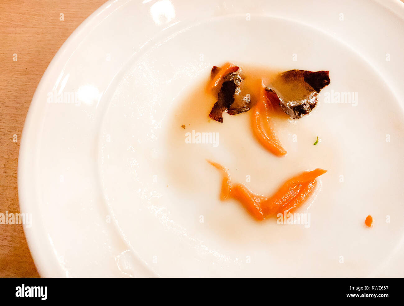 funny happy smiling salad in plate, delicious healthy food carrot ...