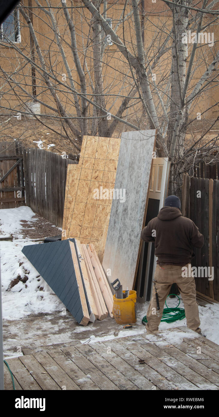 Morning construction worker building on private residence Stock Photo ...