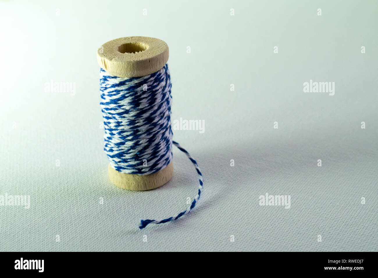 String on a bobbin hi-res stock photography and images - Alamy