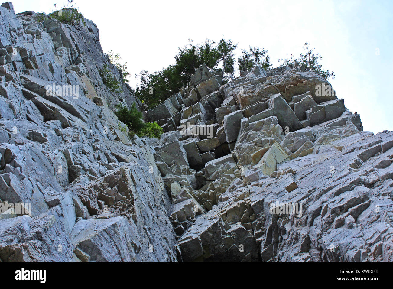 Limestone bluff topped with trees on Eagle Trail in a forest in ...