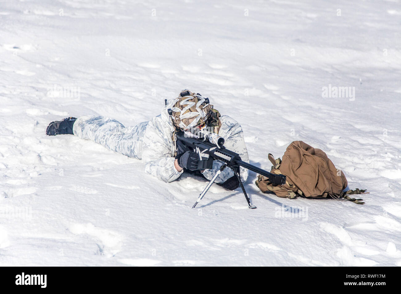 Army soldier with sniper rifle in action in the arctic Stock Photo - Alamy