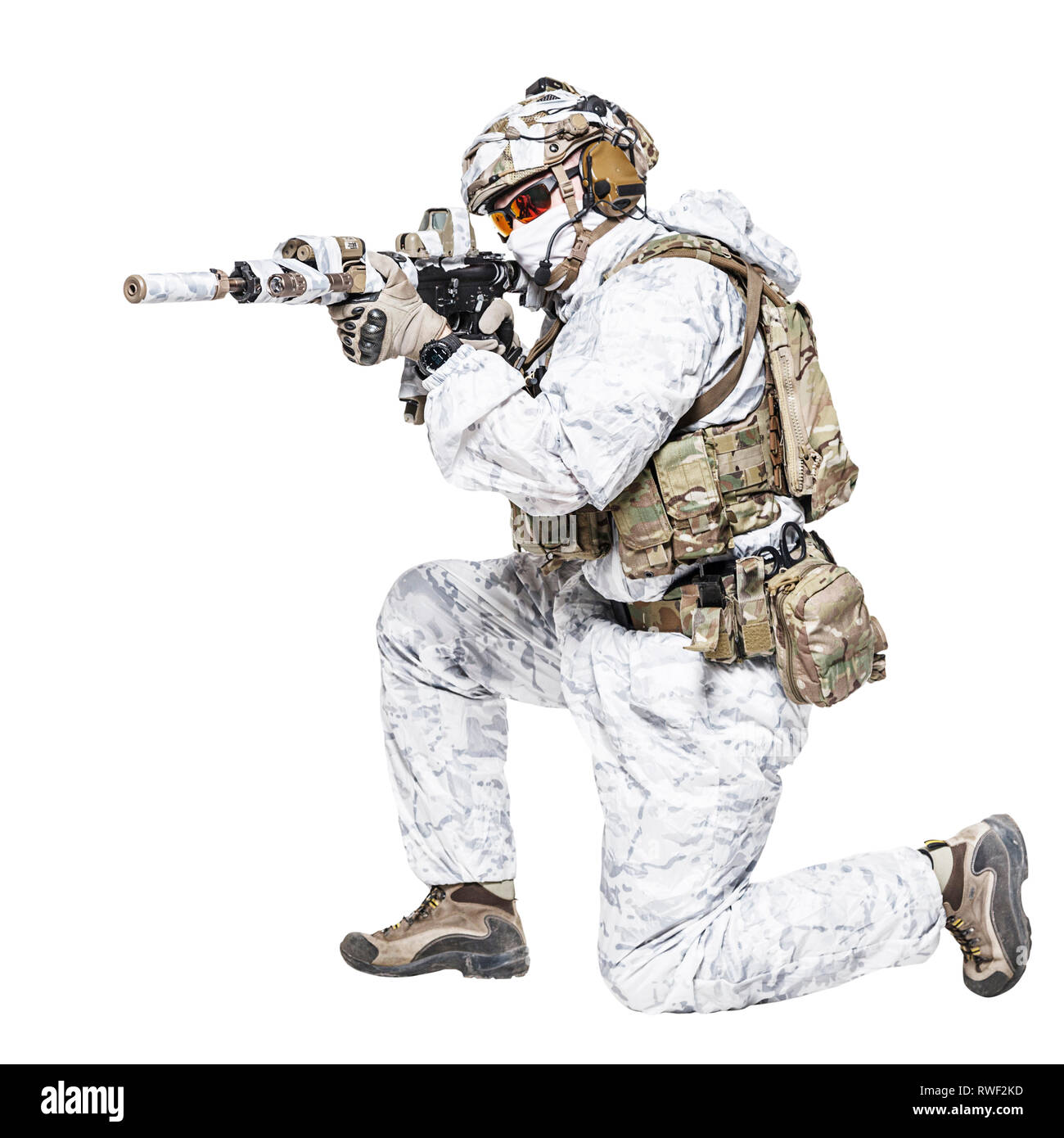 Special forces operator of Navy Seals shooting an assault rifle in ...