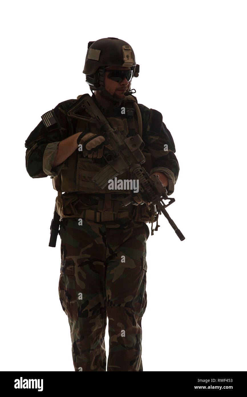 Studio shot of U.S. Marine Corps Marsoc raider with weapon, white ...