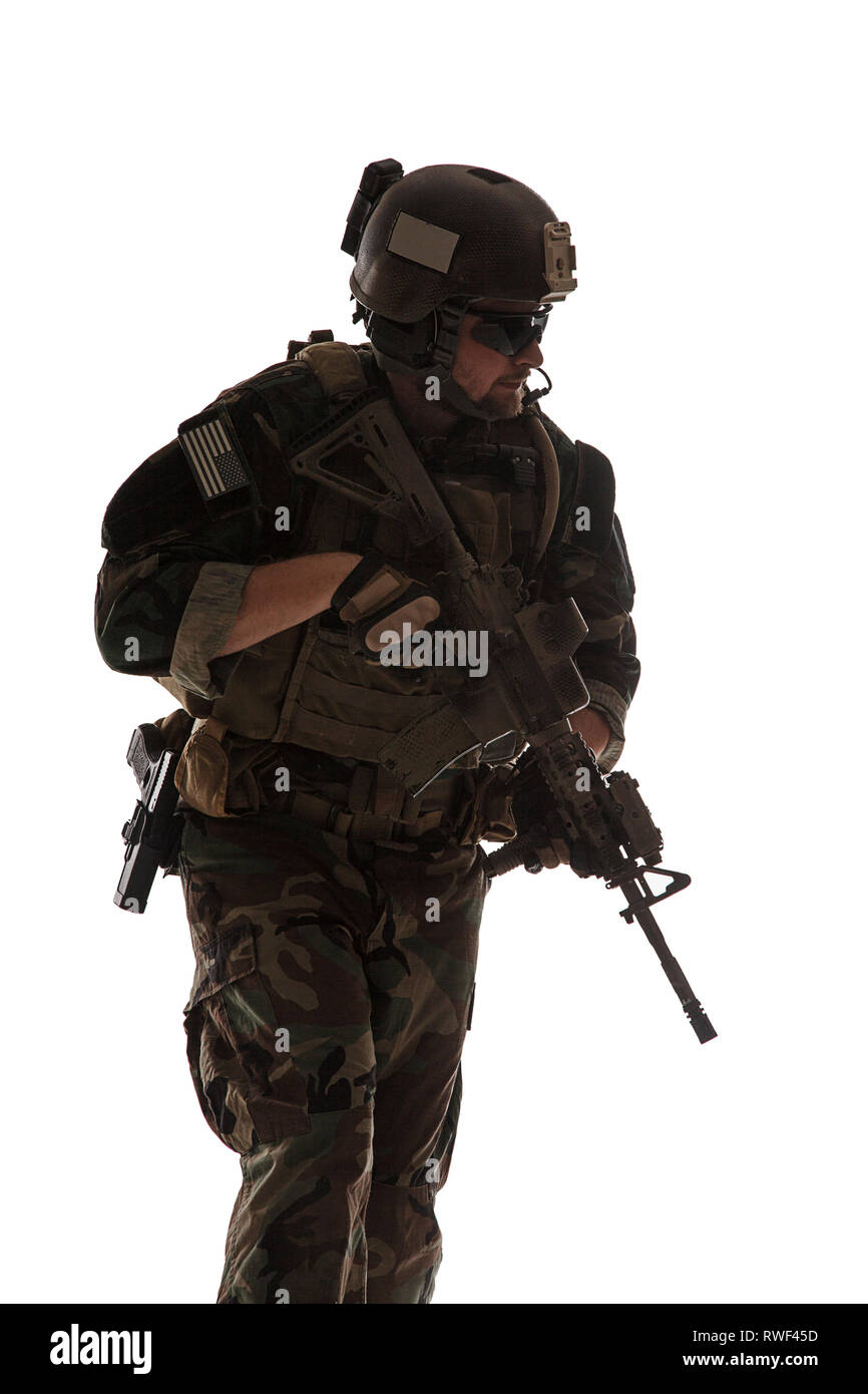 Studio shot of U.S. Marine Corps Marsoc raider with weapon, white ...