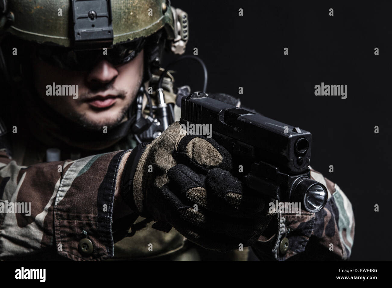 U.S. Marine Corps special operations command Marsoc raider with pistol ...