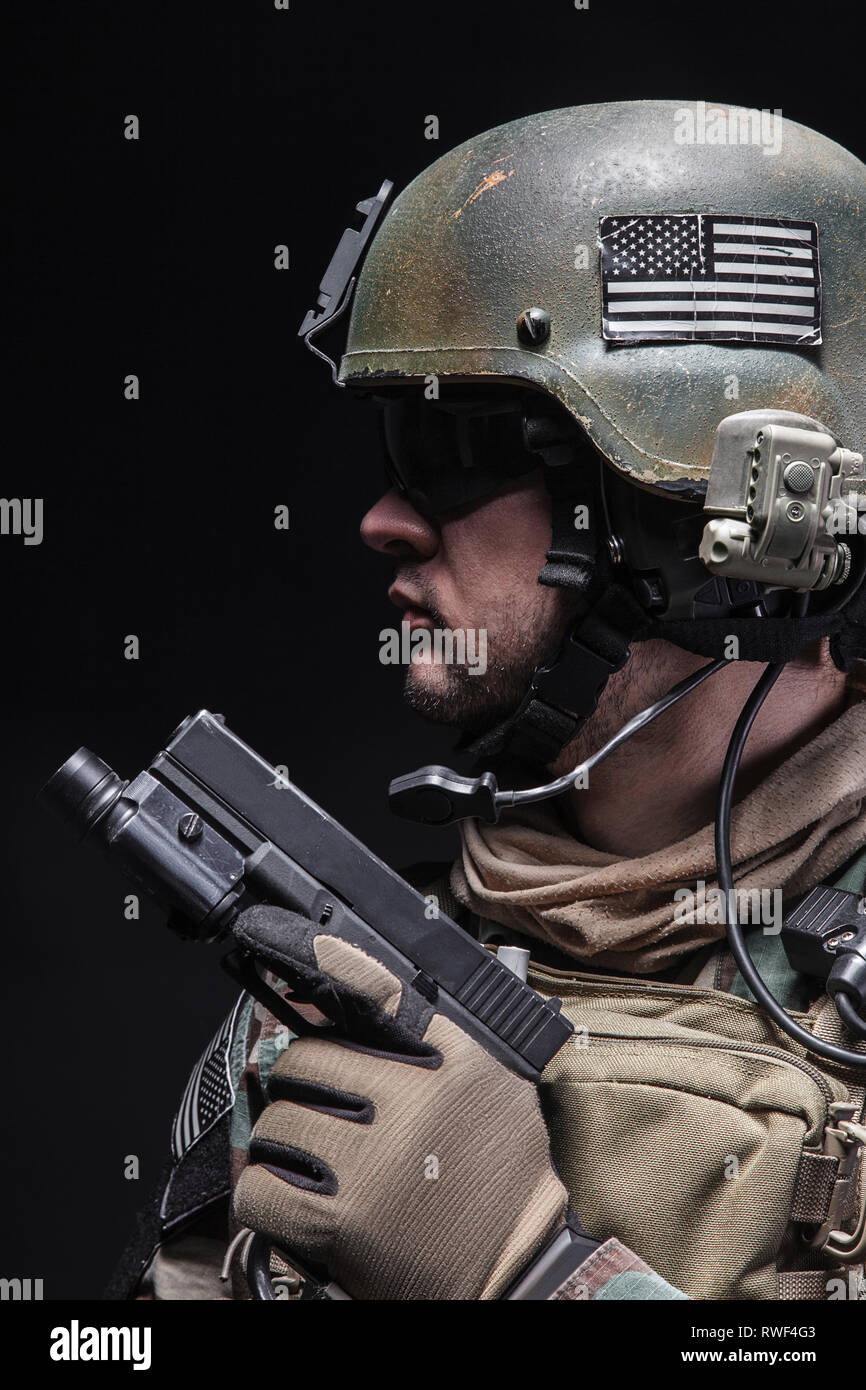 U.S. Marine Corps special operations command Marsoc raider with pistol ...