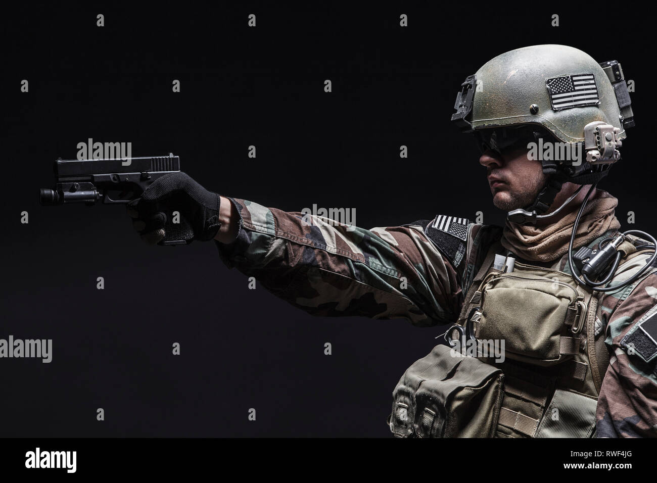 U.S. Marine Corps special operations command Marsoc raider with pistol ...