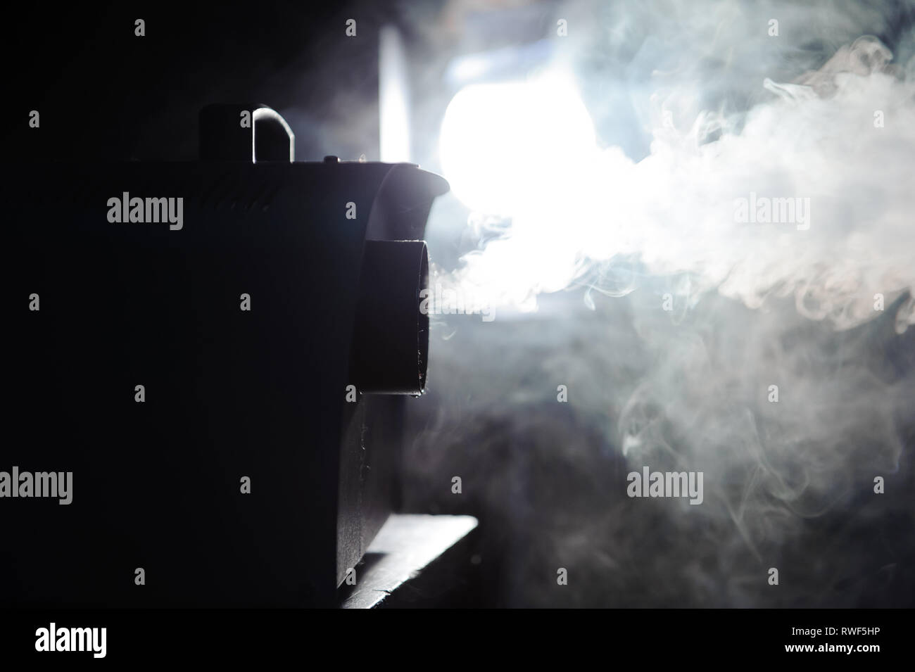 lights in smoke, studio lights shining through the smoke from smoke ...