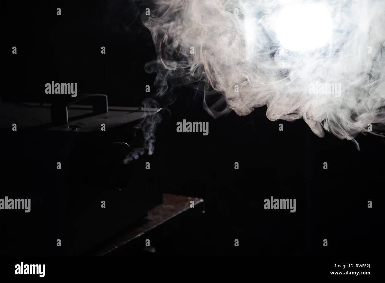 lights in smoke, studio lights shining through the smoke from smoke ...