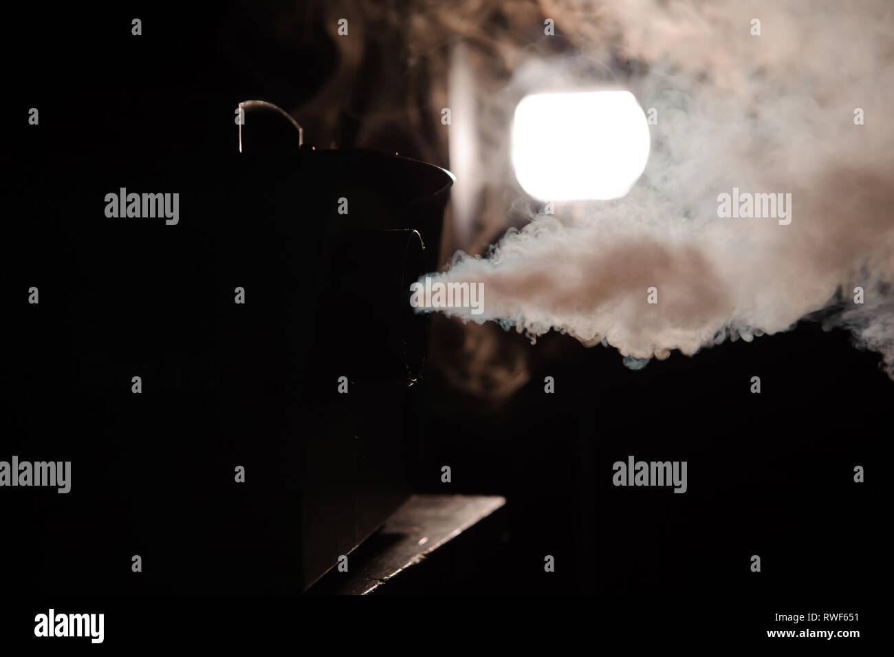 lights in smoke, studio lights shining through the smoke from smoke ...