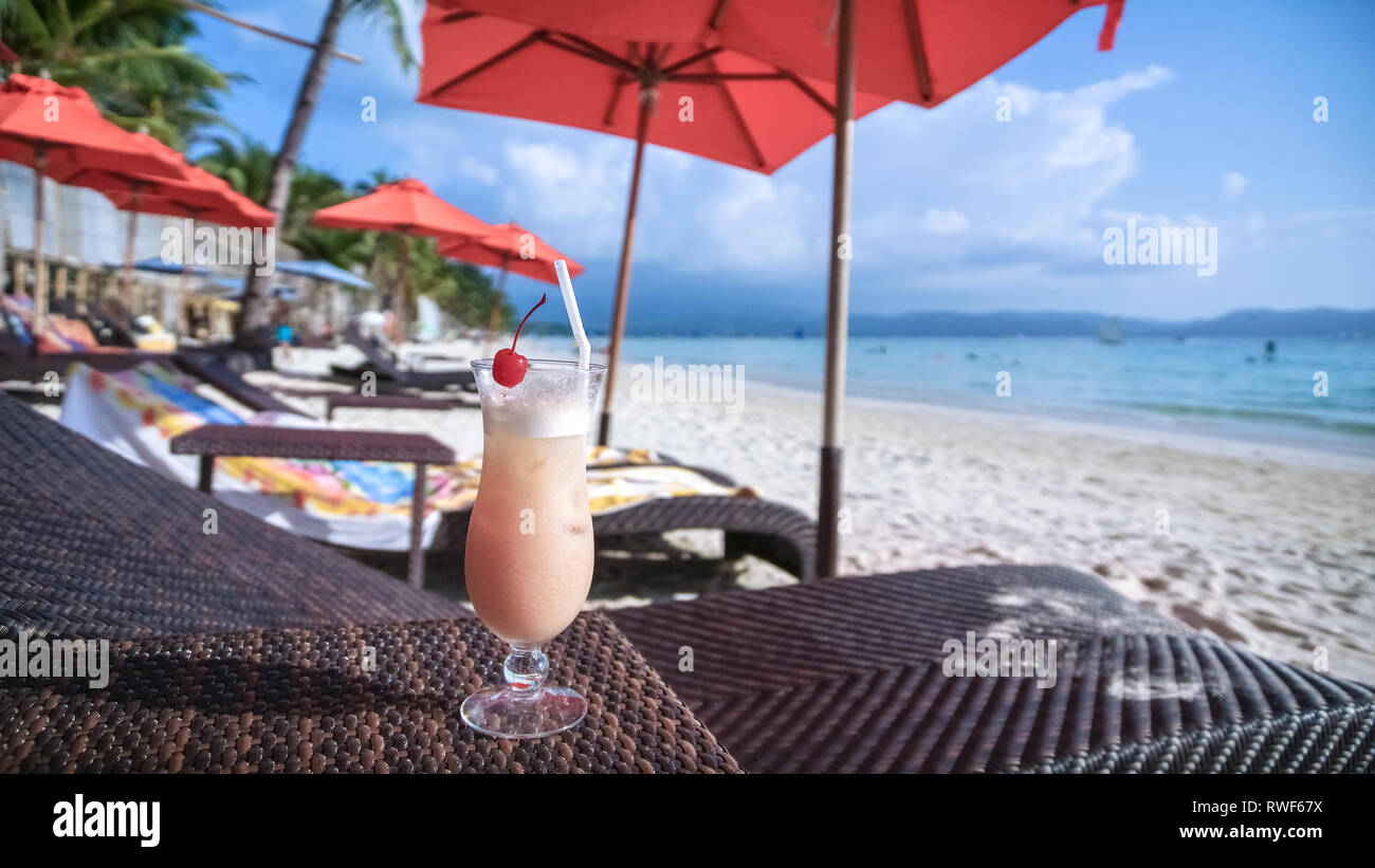 Tropical Cocktail with Cherry, by Red Beach Umbrellas - Boracay Island ...