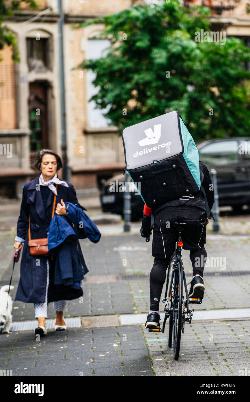 Paris, France - Sep 12, 2017: Rear view of Deliveroo cyclist fast ...