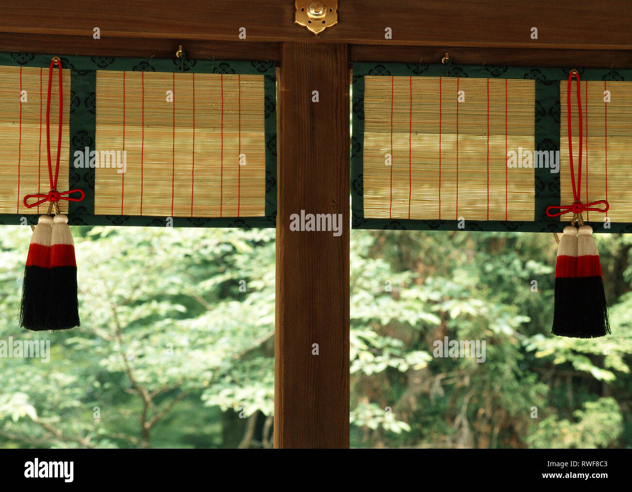 Japanese architectural decorative items hanging along with wooden works ...