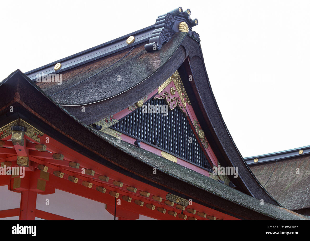 Japanese shrine black and red roof with gold details Stock Photo - Alamy