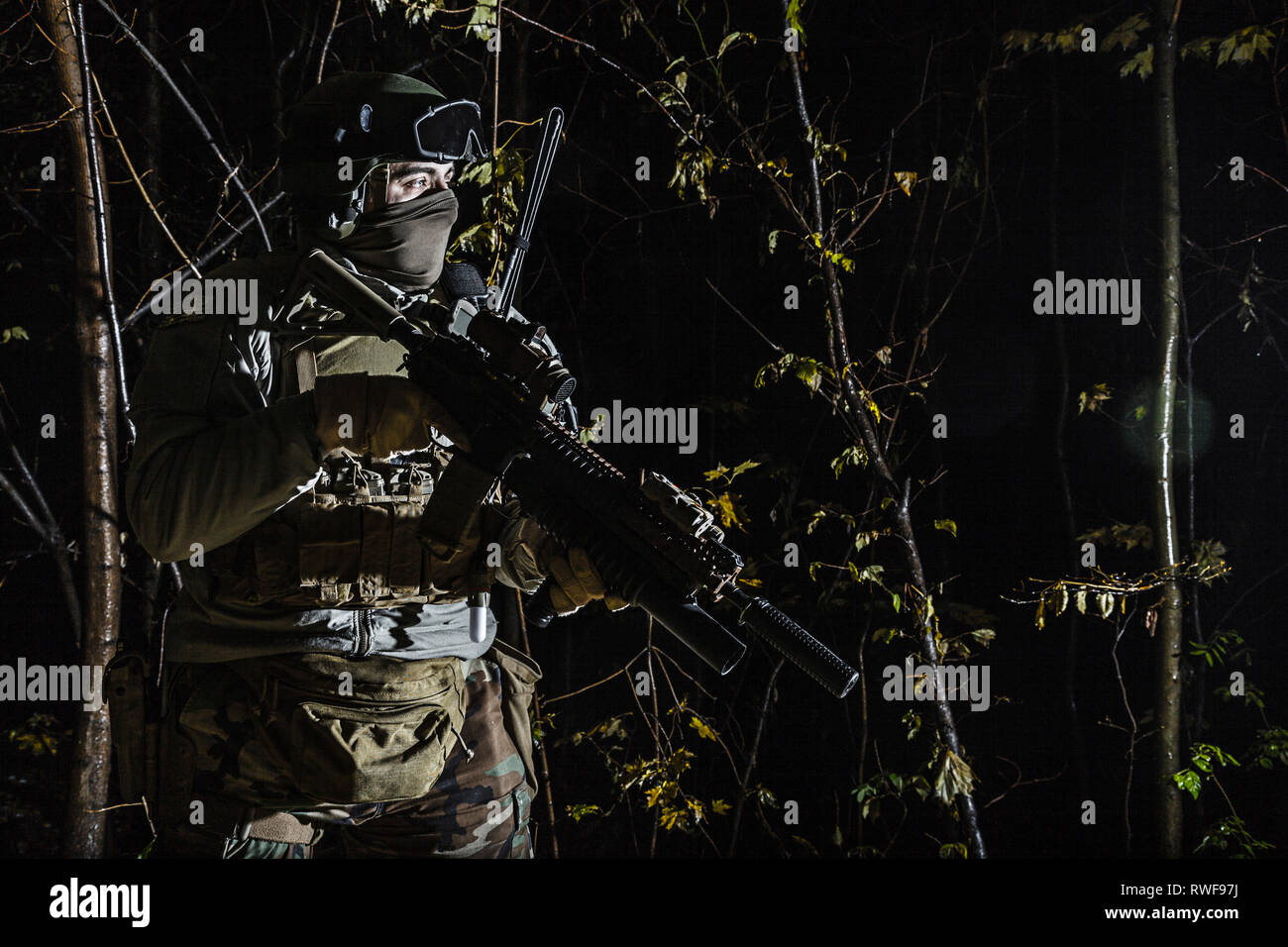 U.S. Marine Corps Marsoc raider with weapon at night Stock Photo - Alamy