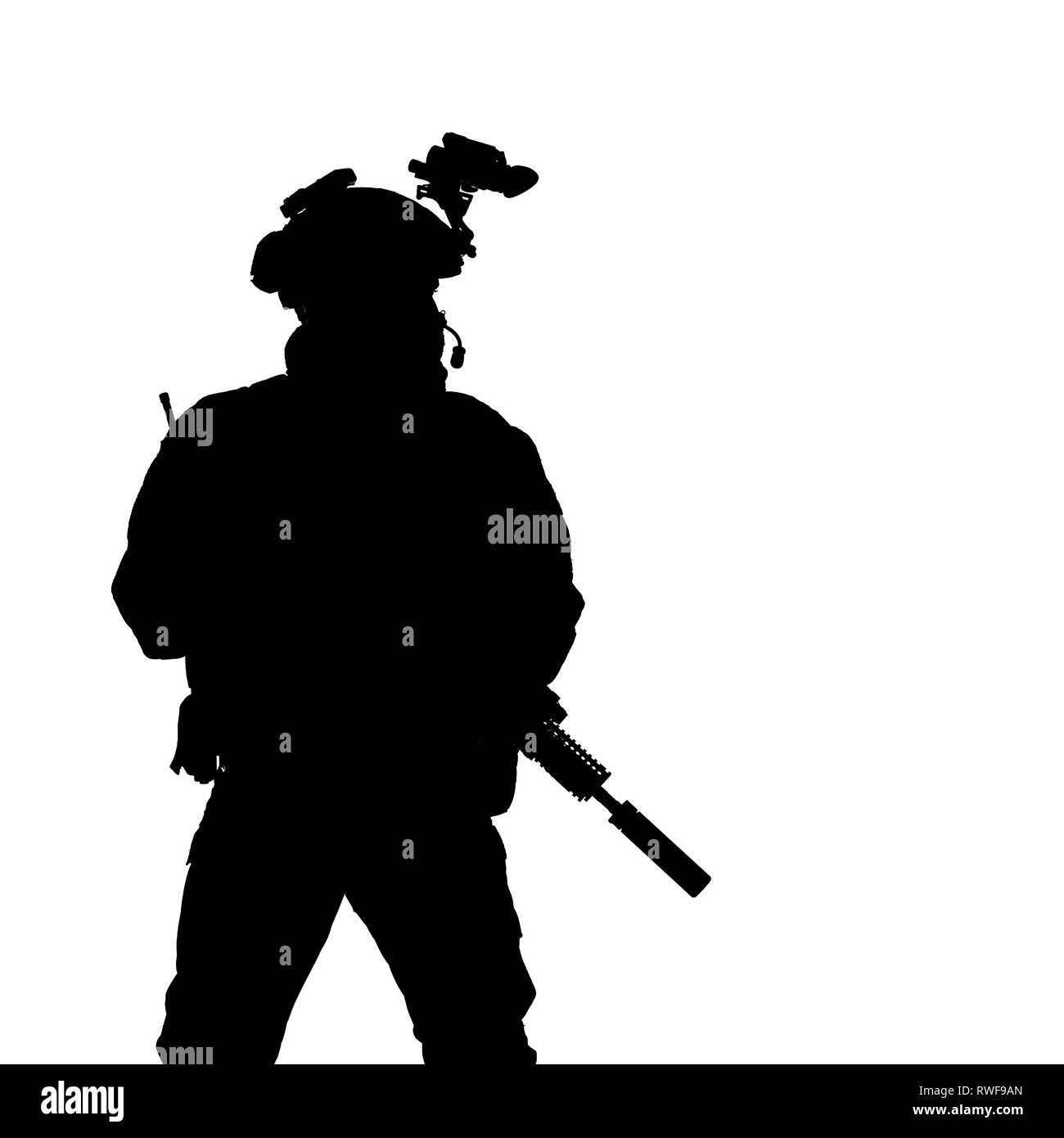 Security forces silhouette with weapon, studio shot Stock Photo - Alamy