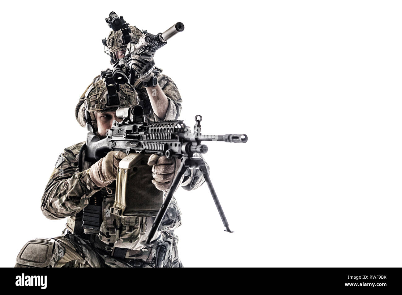 Two Army Rangers in field uniforms with weapons, studio shot Stock ...