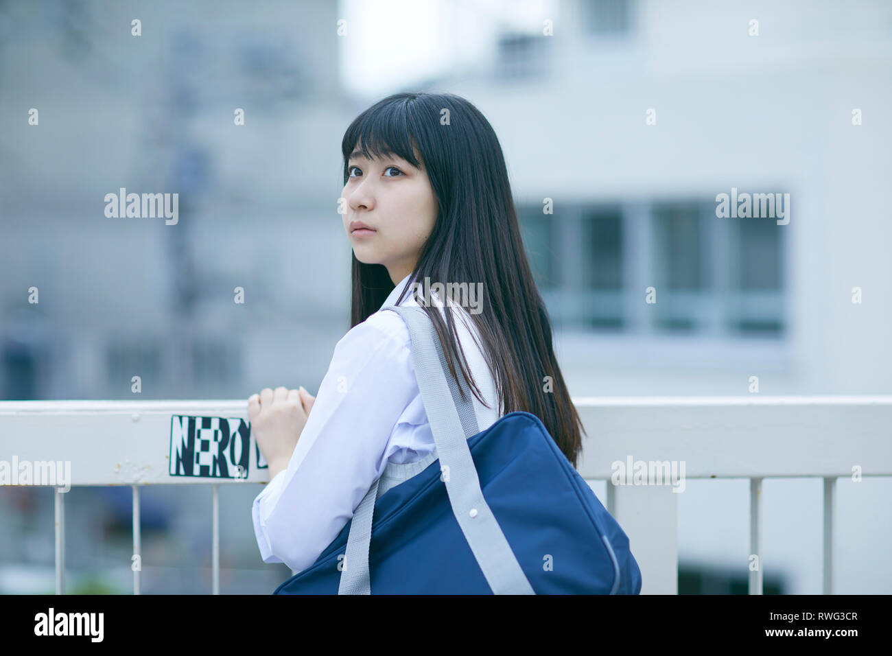 Japanese high school student in uniform downtown Tokyo Stock Photo - Alamy