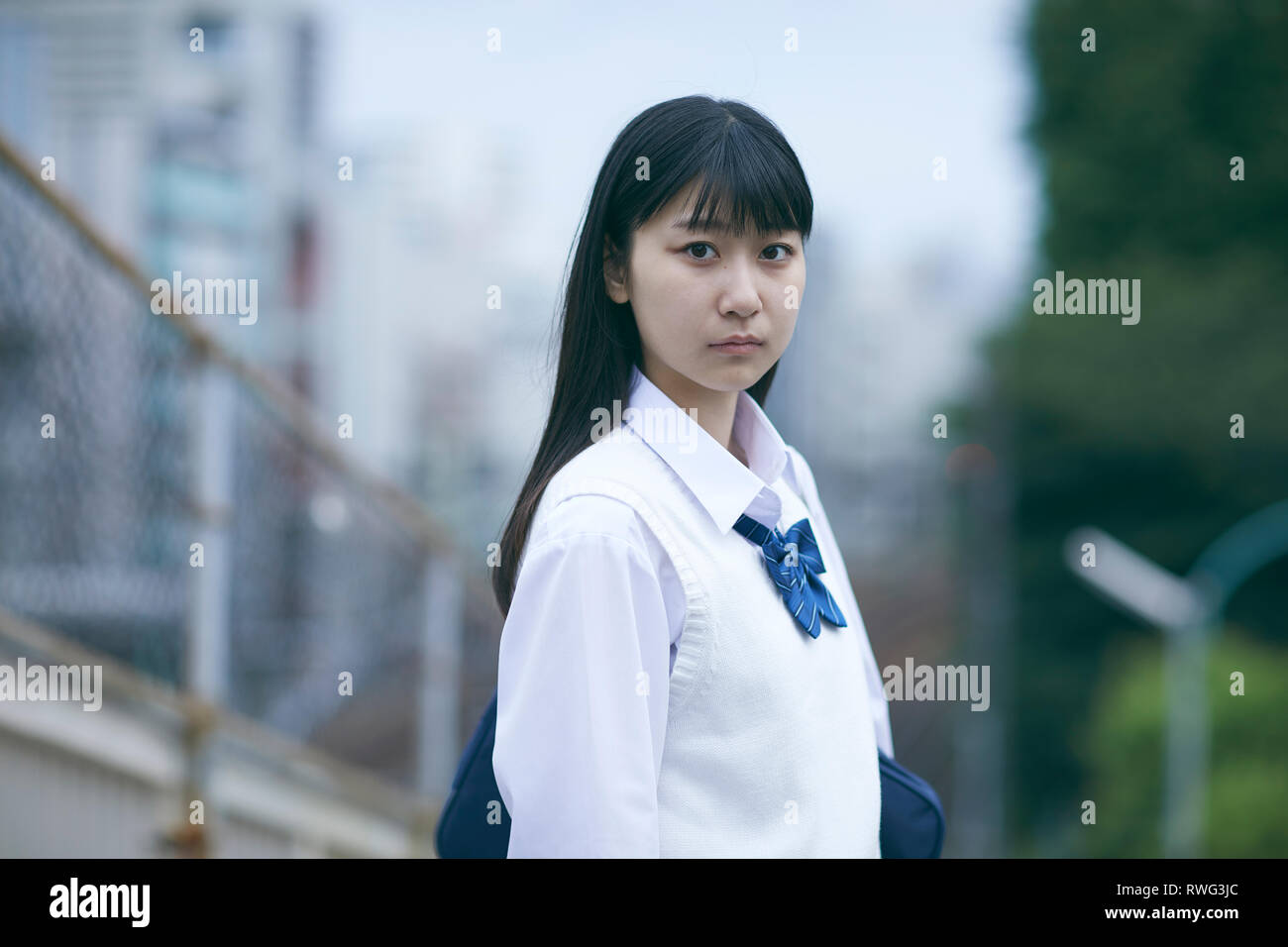 Japanese high school student in uniform downtown Tokyo Stock Photo - Alamy