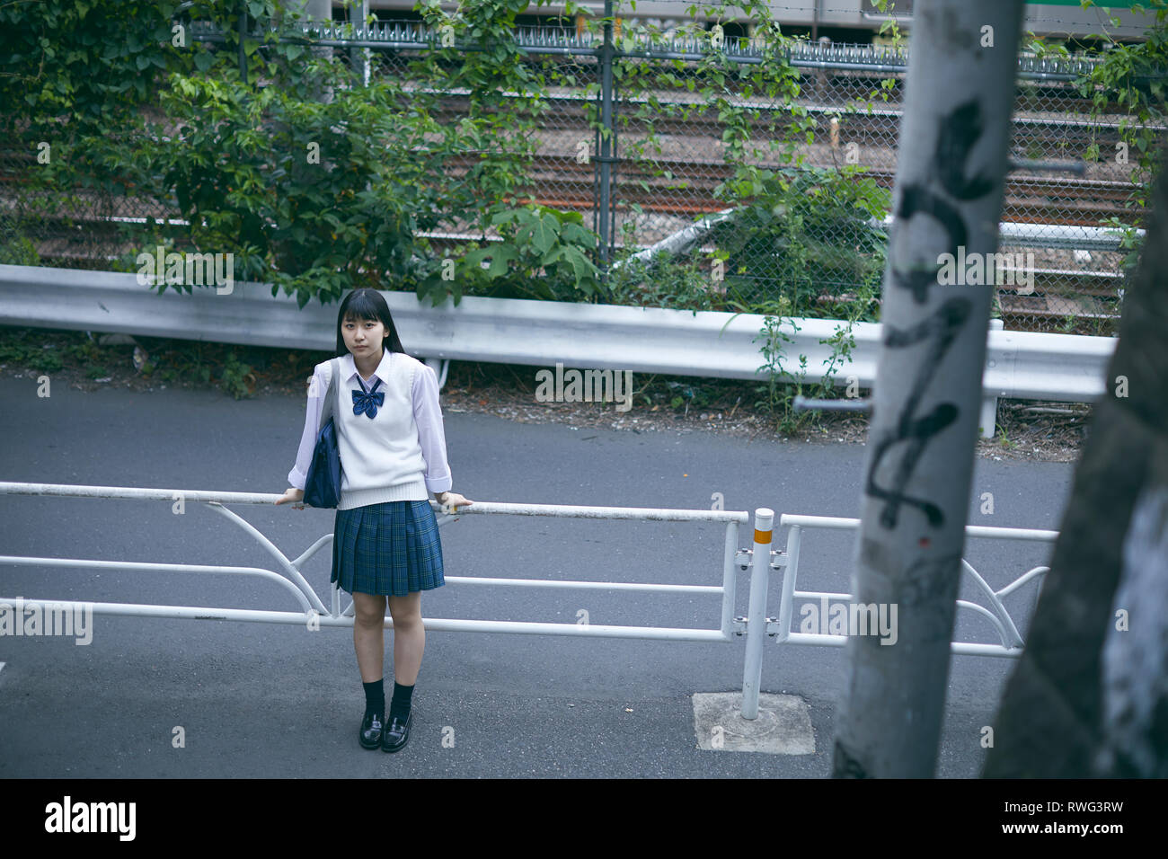 Japanese high school student in uniform downtown Tokyo Stock Photo - Alamy